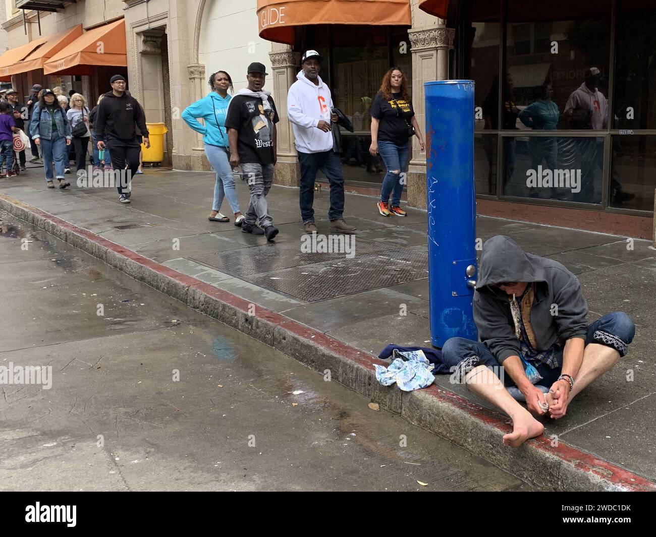 San Francisco, California, USA. 26th Aug, 2023. A homeless man washes ...