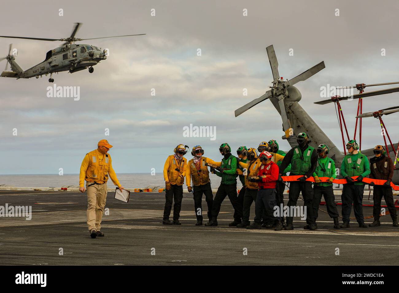 PACIFIC OCEAN (Jan. 16, 2024) U.S. Sailors participate in flight deck ...