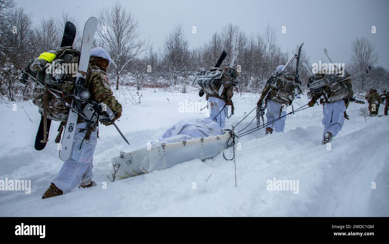 Soldiers with the 2nd Battalion, 87th Infantry Regiment drag a sled ...