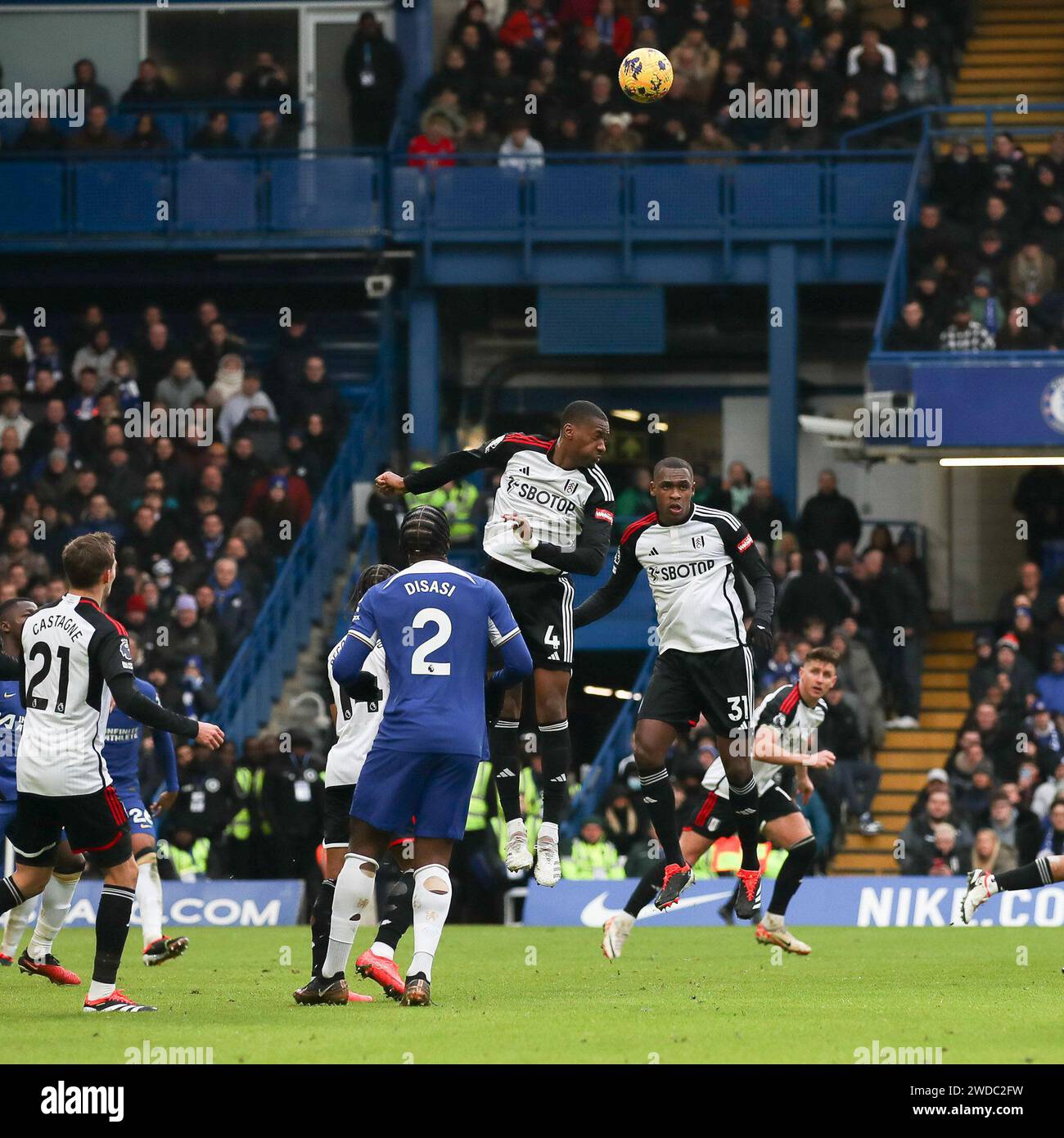London, UK. 14th Jan, 2024. Tosin Adarabioyo of Fulham heads clear ...