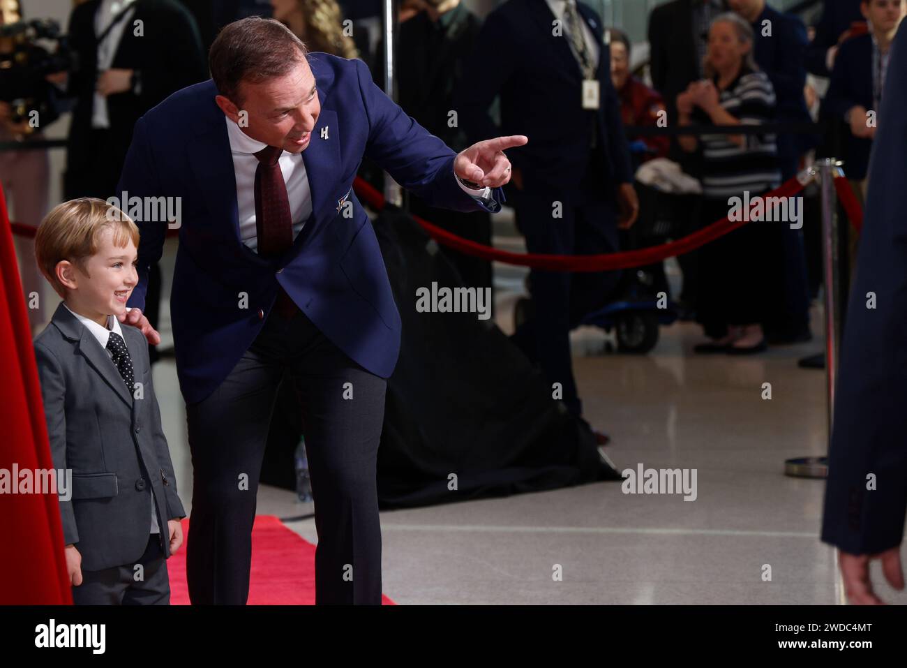 Chad Knaus stands with his son Kipling Knaus as they arrive for his ...