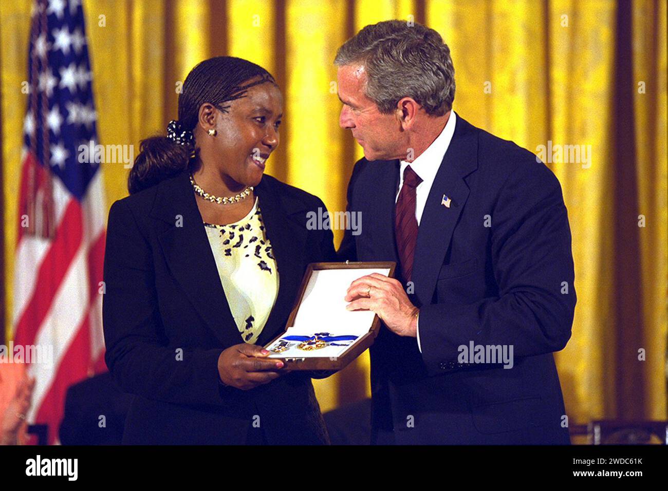 President George W. Bush presents the Presidential Medal of Freedom to ...