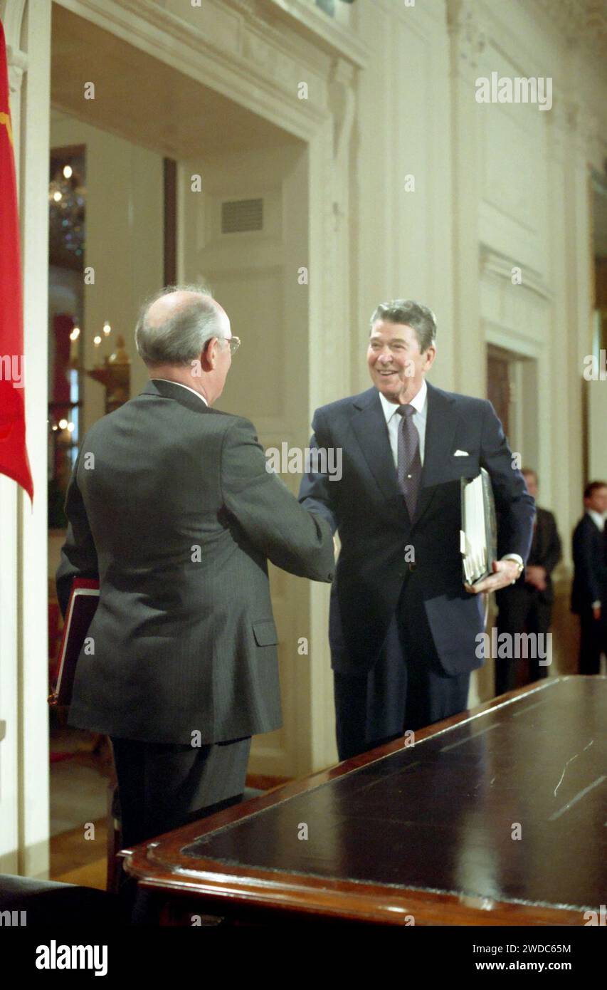 President Ronald Reagan and Soviet General Mikhail Gorbachev shaking ...