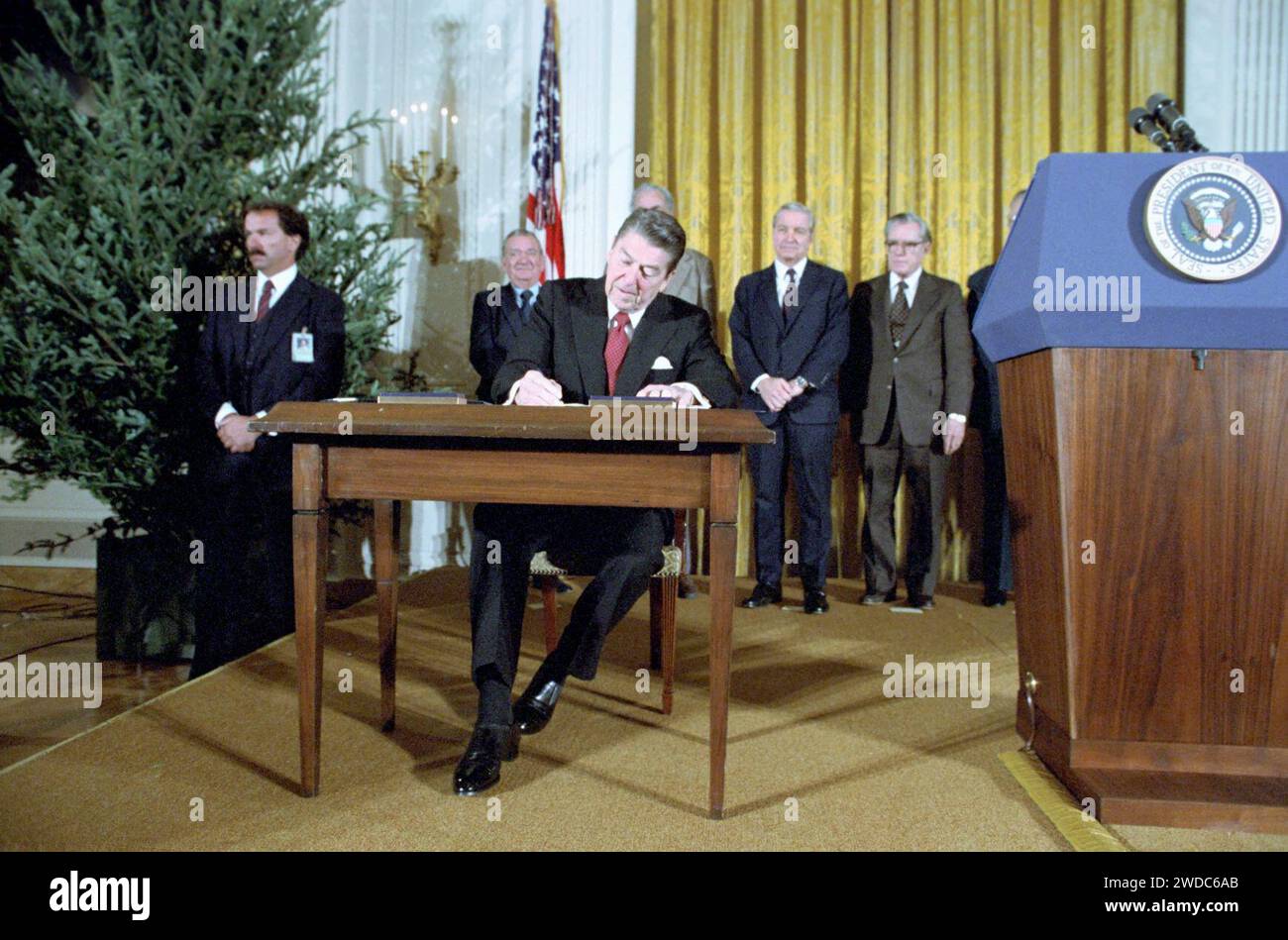 President Ronald Reagan signs Proclamations 5003 and 5004 to ...