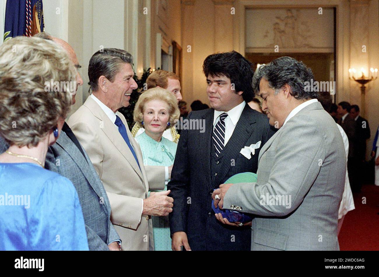 President Ronald Reagan shaking hands with Fernando Valenzuela and ...