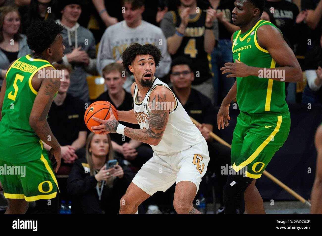 Colorado guard J'Vonne Hadley (1) and Oregon center N'Faly Dante (1) in ...