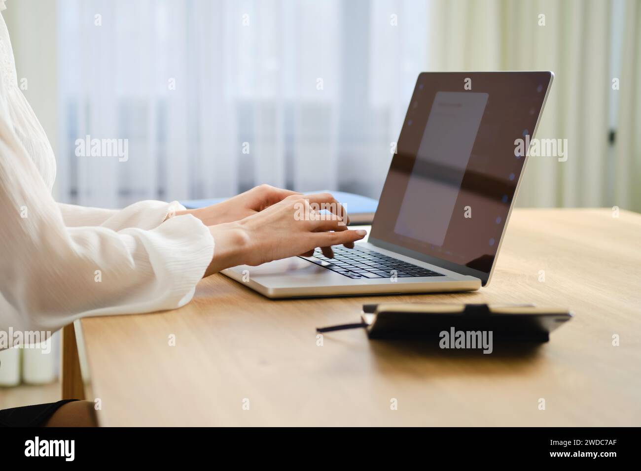 Closeup view of female hands typing application for dismissal Stock Photo - Alamy