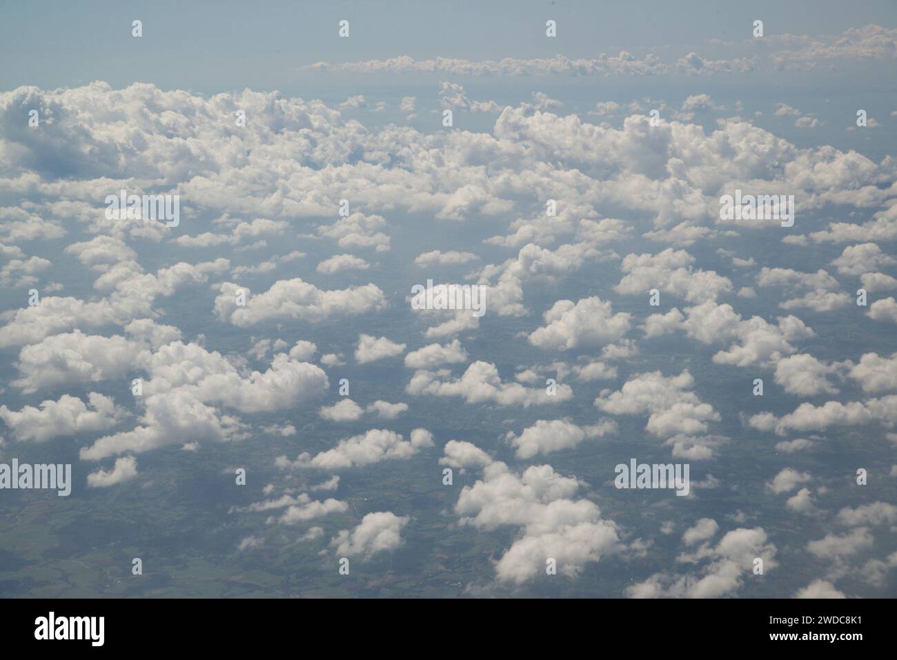 Nature background of sky view with clounds from above from airplane and ...