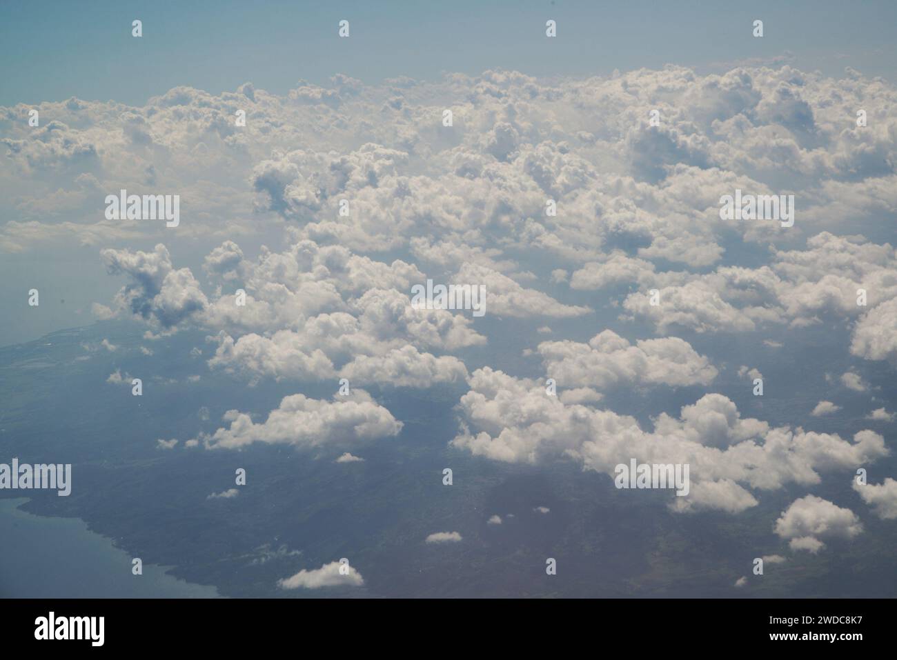 Nature background of sky view with clounds from above from airplane and ...