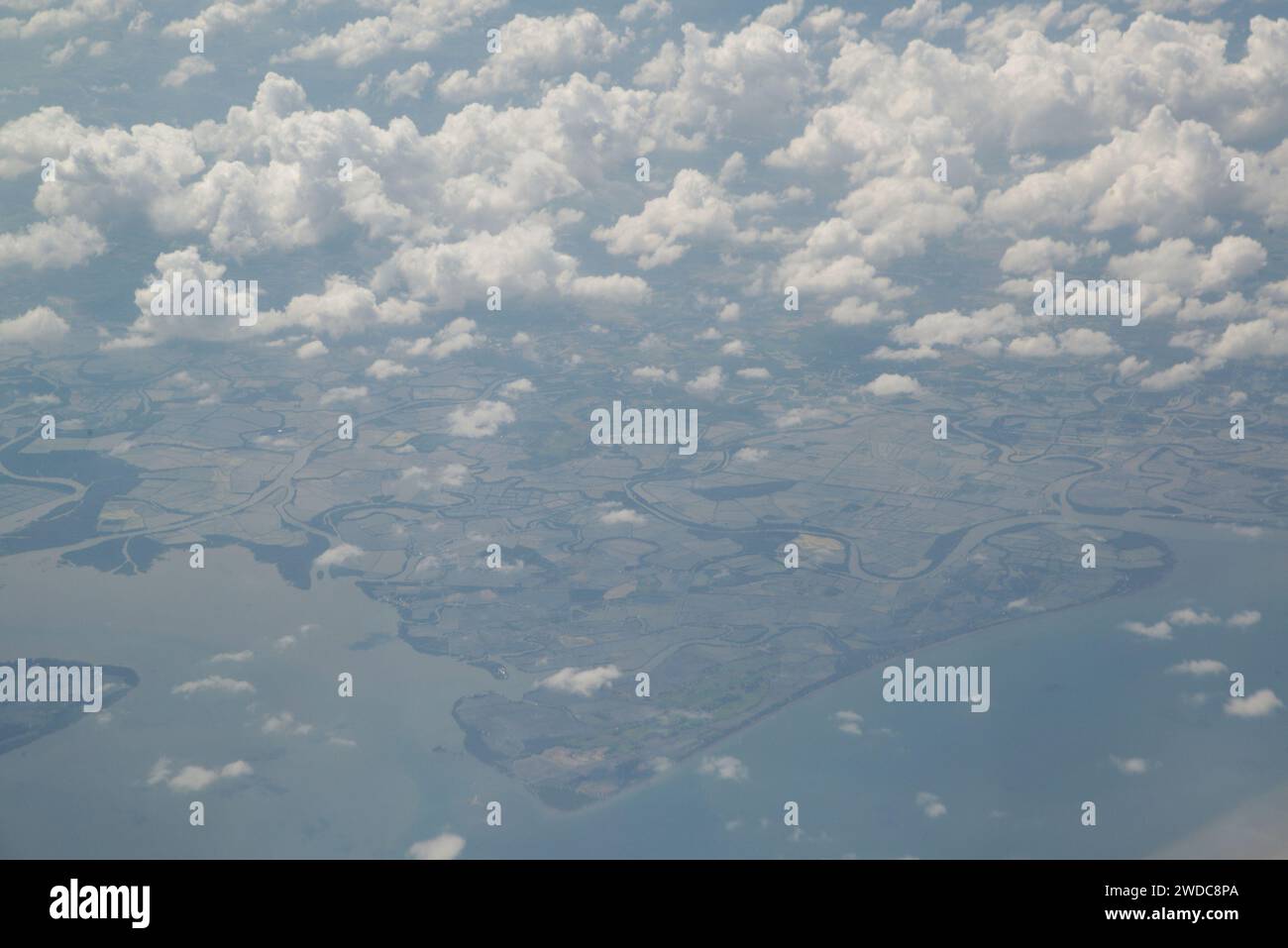 Nature background of sky view with clounds from above from airplane and ...