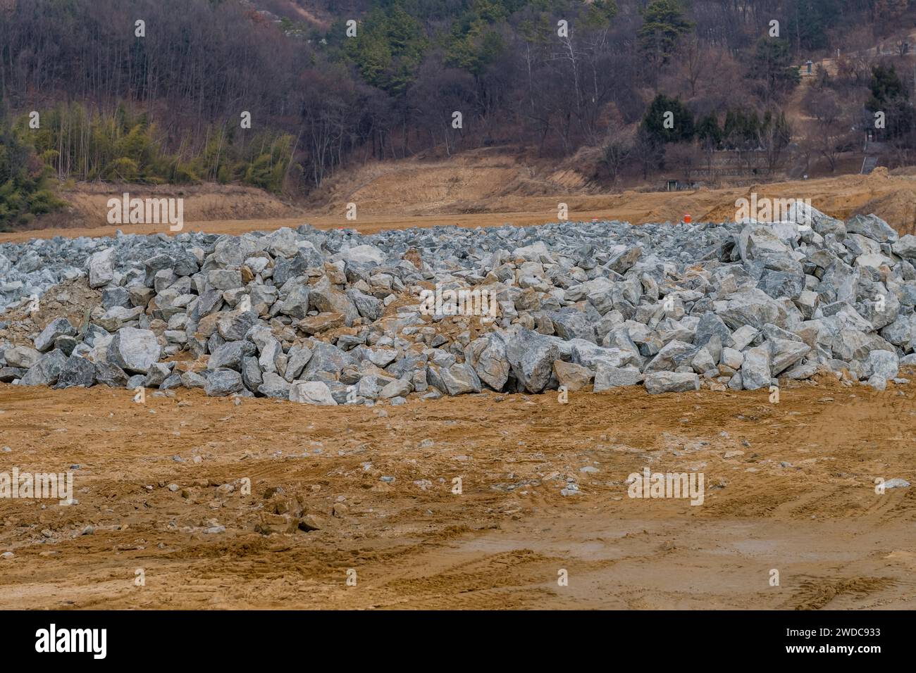 Large field of quarried stones and boulders in field at construction ...