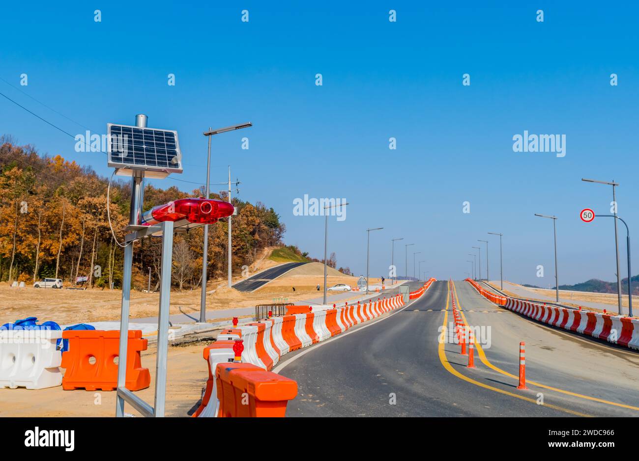 Red and blue flashing police lights mounted on metal frame powered by ...