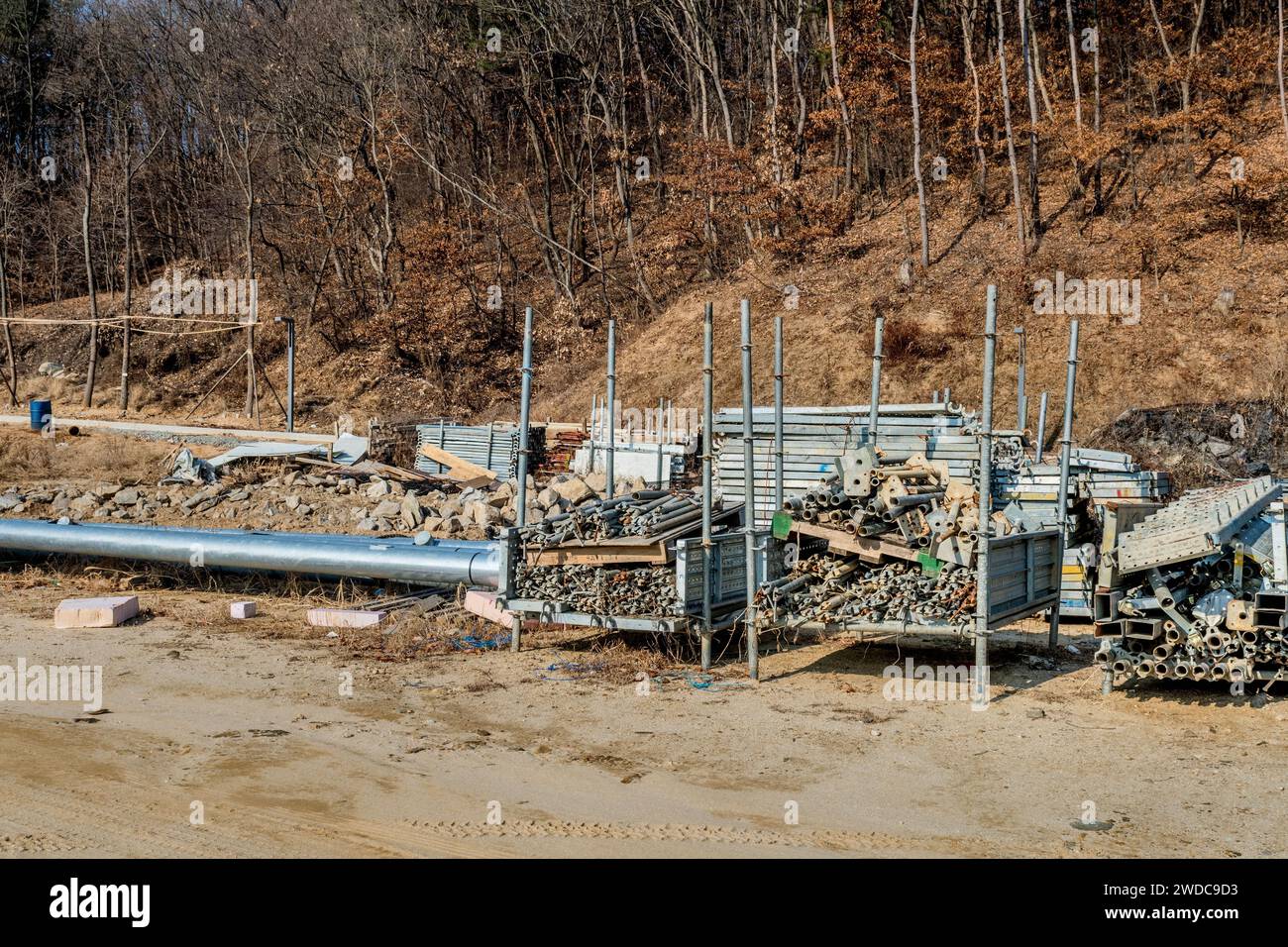 Sections of scaffolding stacked for storage at clearing of new ...