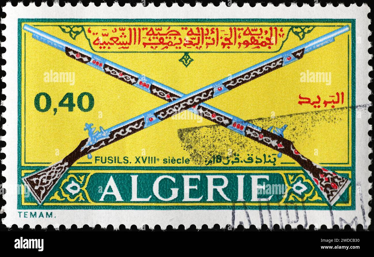 Guns of 18th century on algerian postage stamp Stock Photo - Alamy