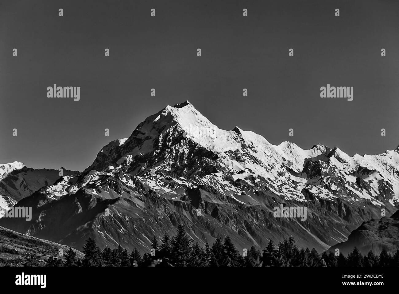 Contrast black-white snow capped mount Cook peak in New Zealand above ...