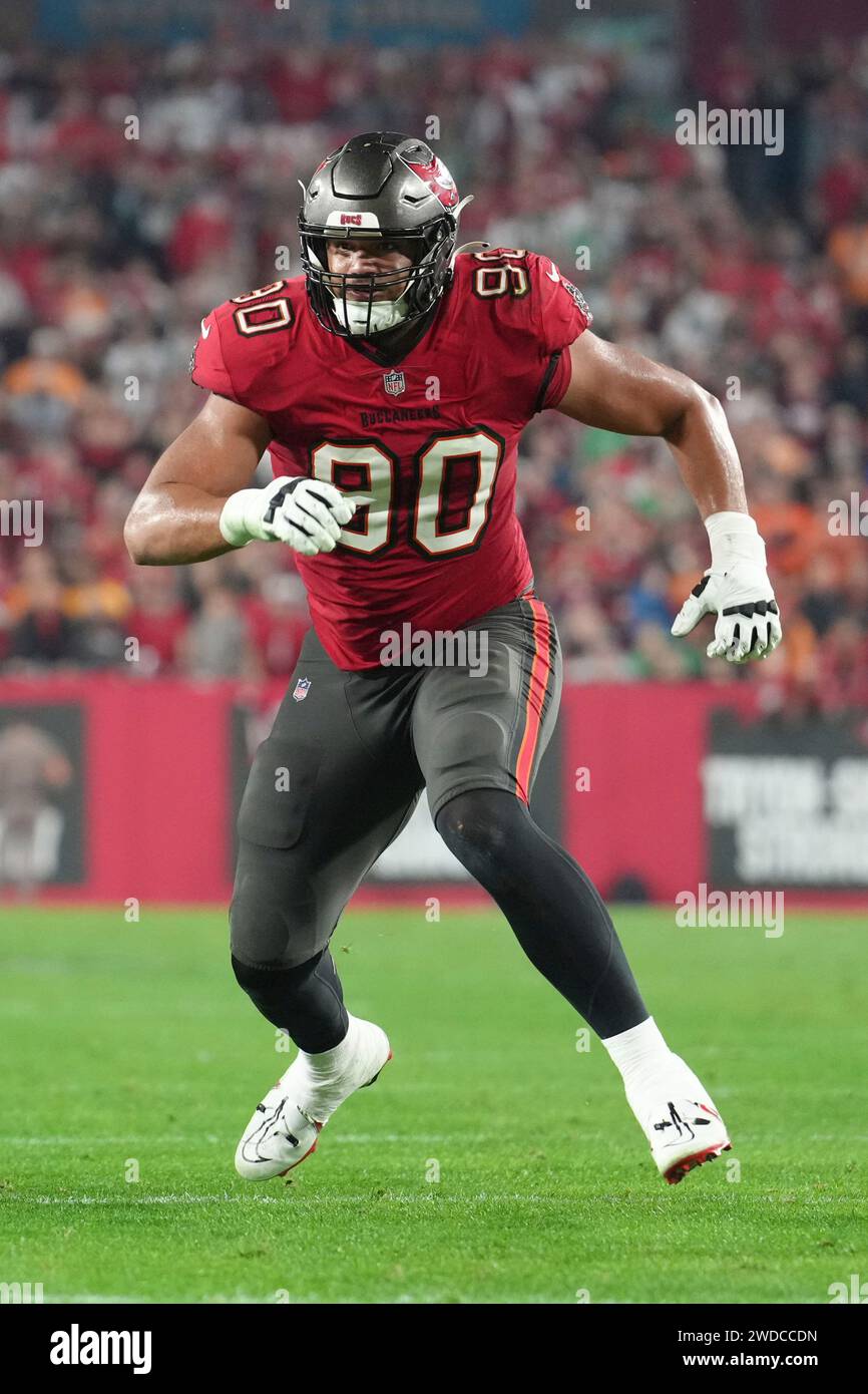 Tampa Bay Buccaneers defensive end Logan Hall (90) rushes the passer ...
