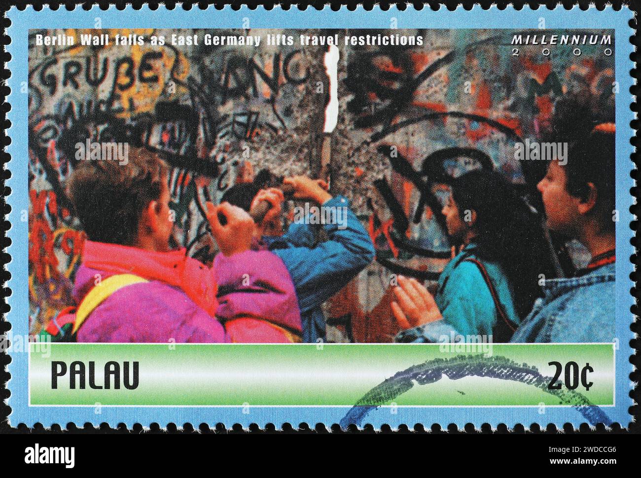 Young people breaking the Berlin Wall on postage stamp Stock Photo - Alamy