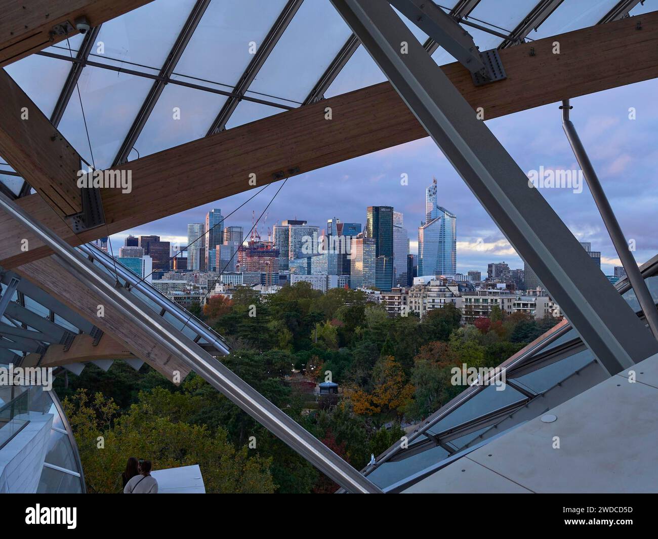 View through a modern steel and glass construction of the Paris skyline ...