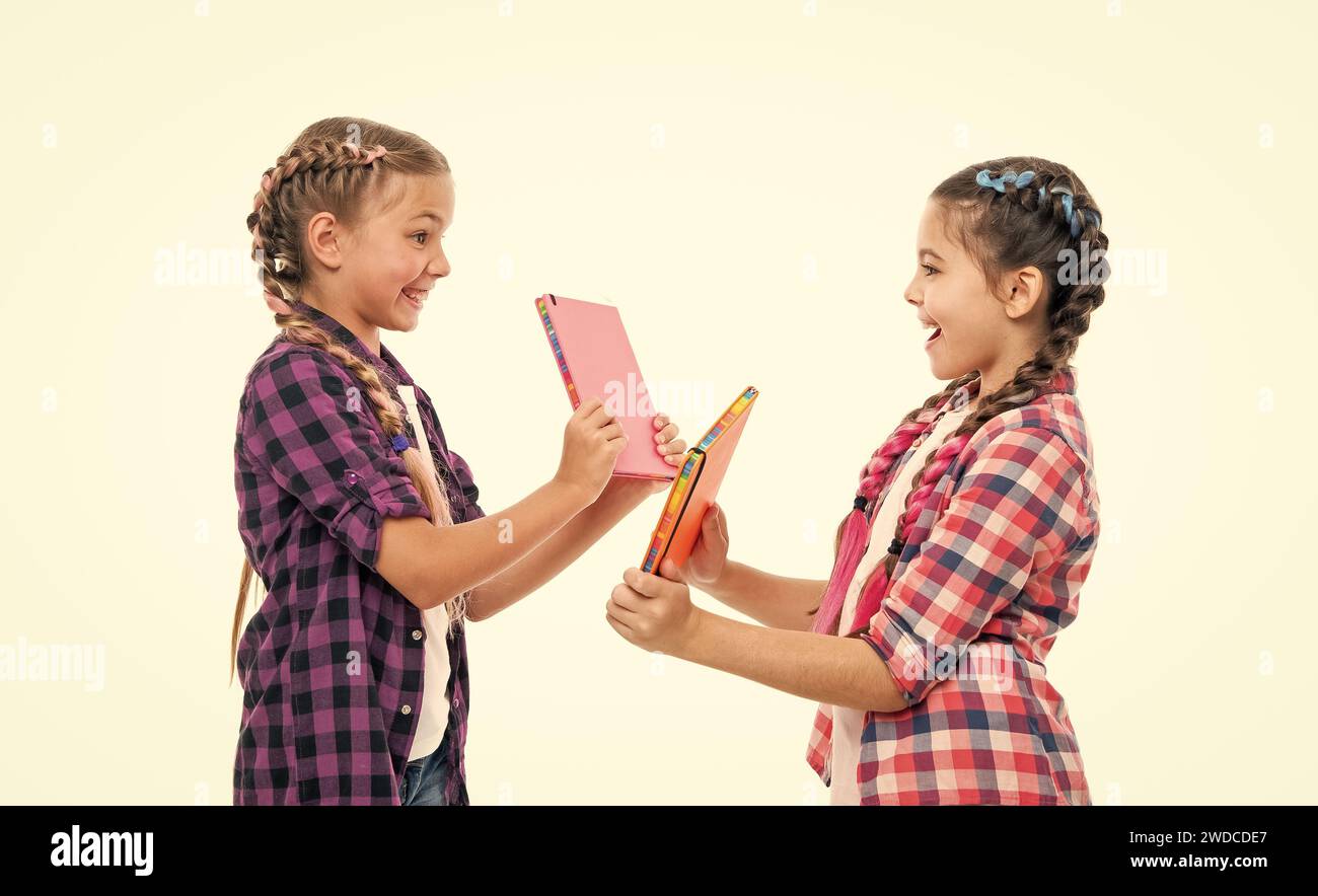 back to school. school children with book. School children and their ...