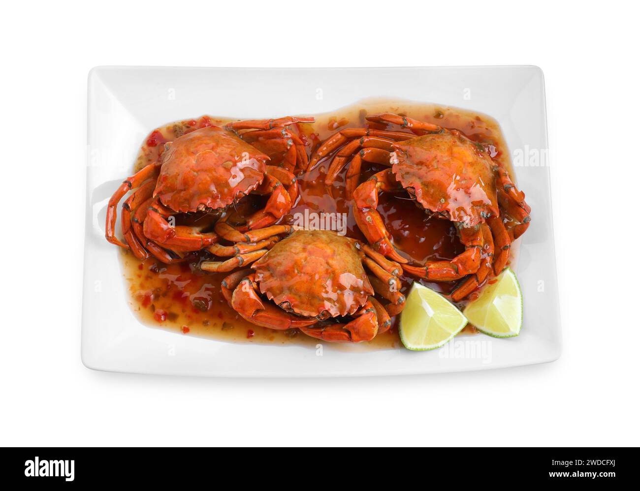 Delicious boiled crabs with sauce and lime isolated on white, top view Stock Photo - Alamy
