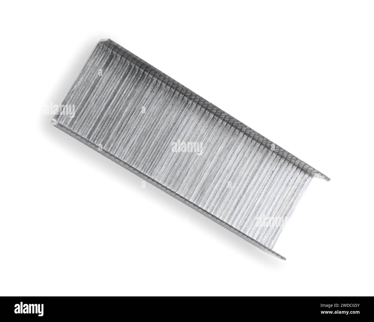 Many staple gun refills isolated on white, top view Stock Photo - Alamy