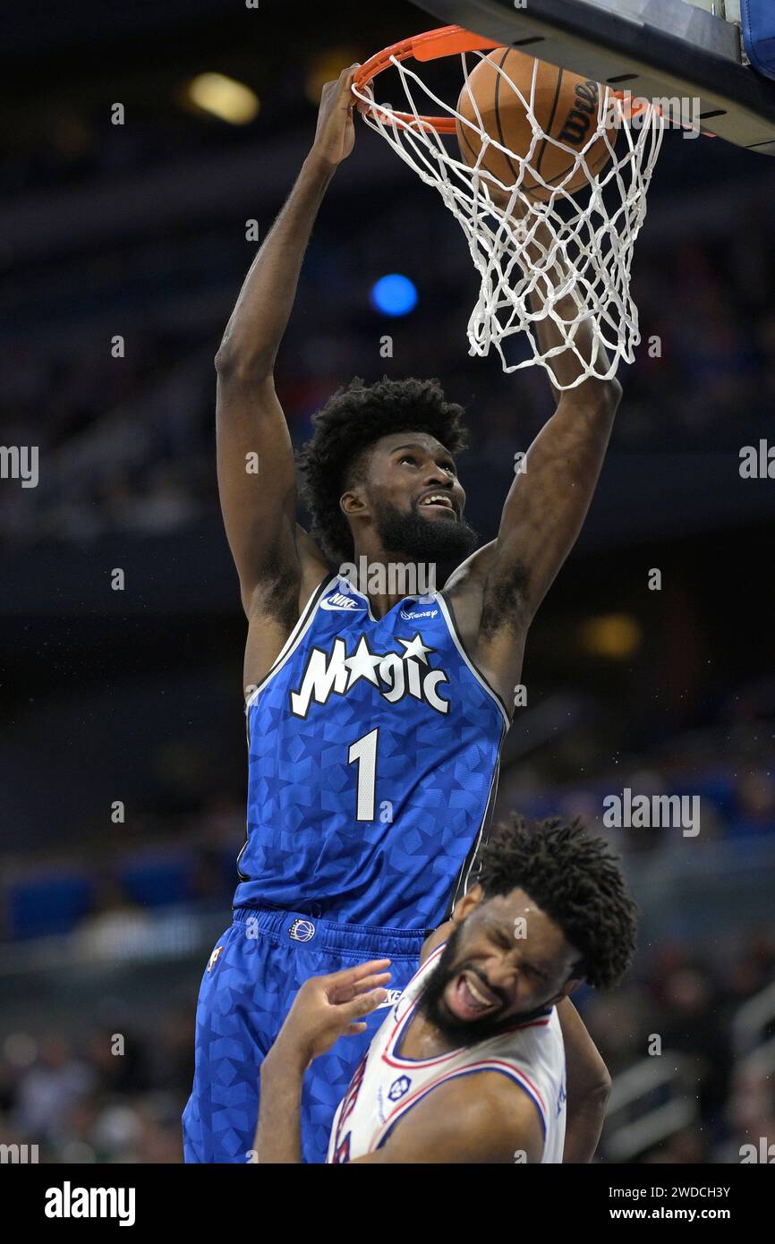 Orlando Magic forward Jonathan Isaac (1) dunks over Philadelphia 76ers ...