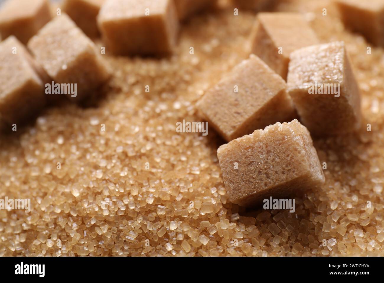 Different types of brown sugar as background, closeup Stock Photo - Alamy