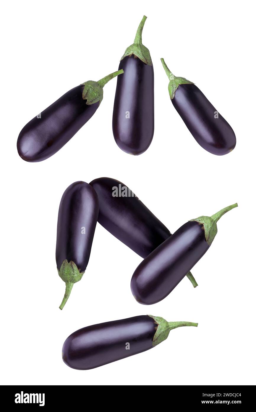 Fresh whole eggplants falling on white background Stock Photo - Alamy