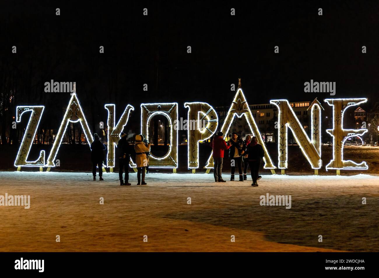Zakopane, Poland. 19th Jan, 2024. Families take a photo in a public ...