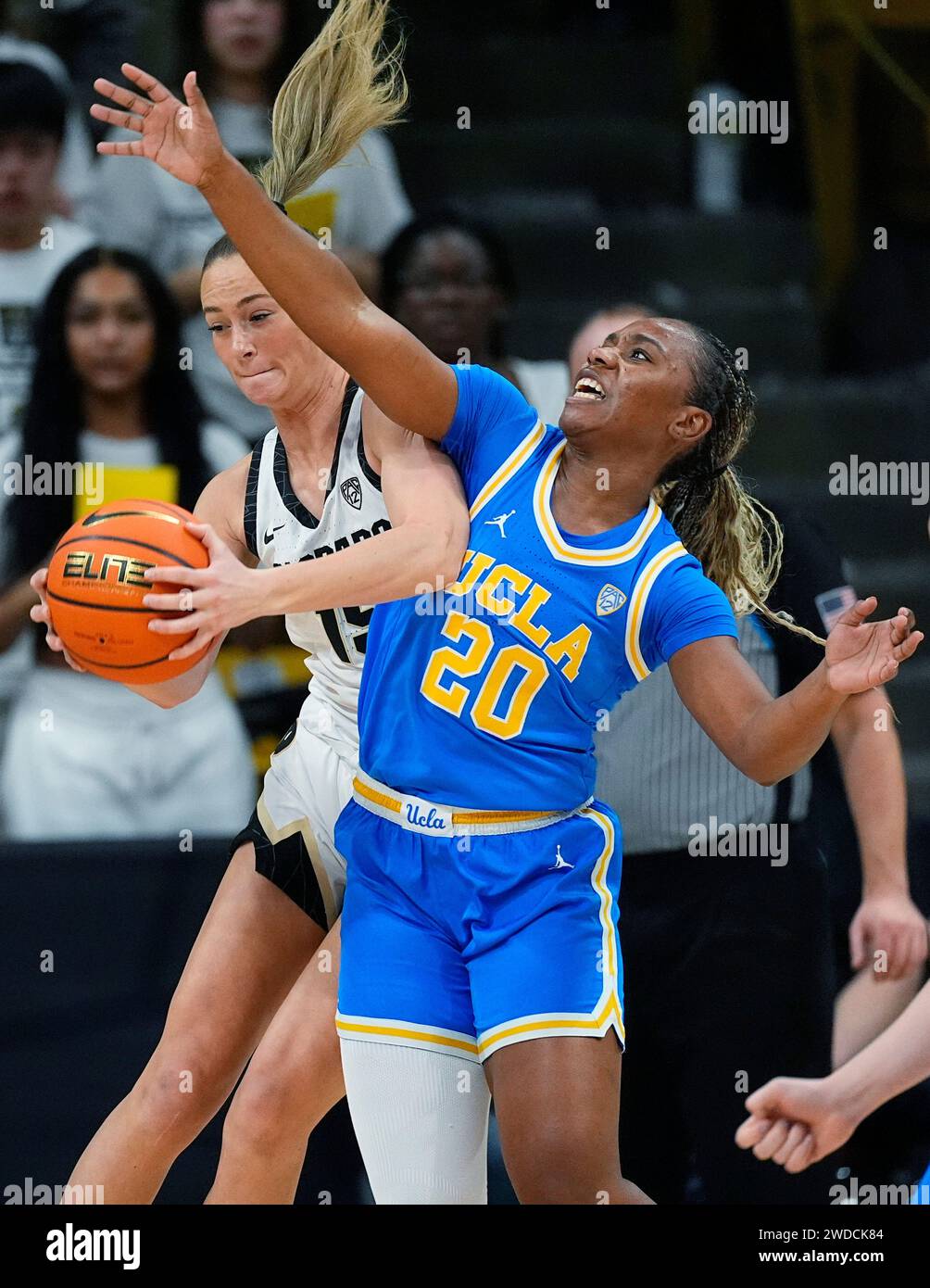 Colorado guard Kindyll Wetta, left, collides with UCLA guard Charisma ...