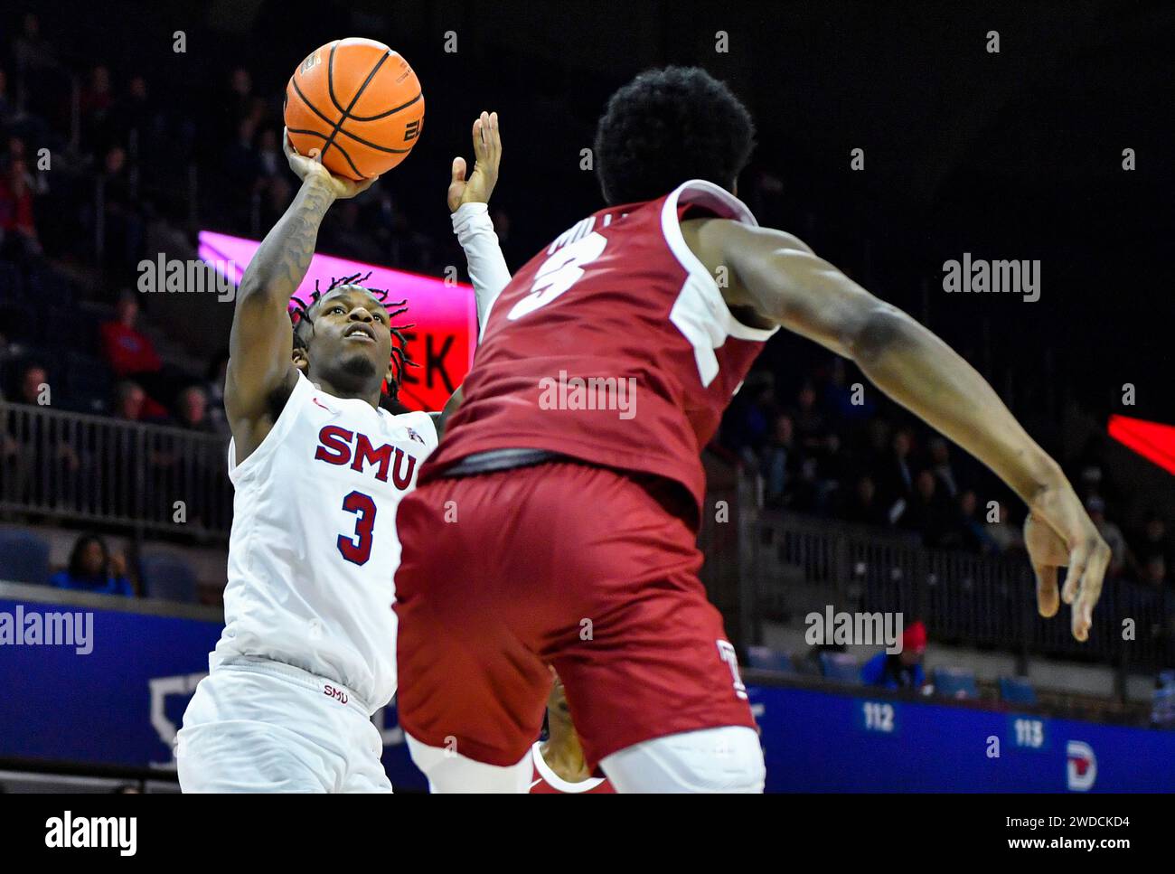 January 16, 2024: SMU Mustangs guard Chuck Harris attempts a shot over ...