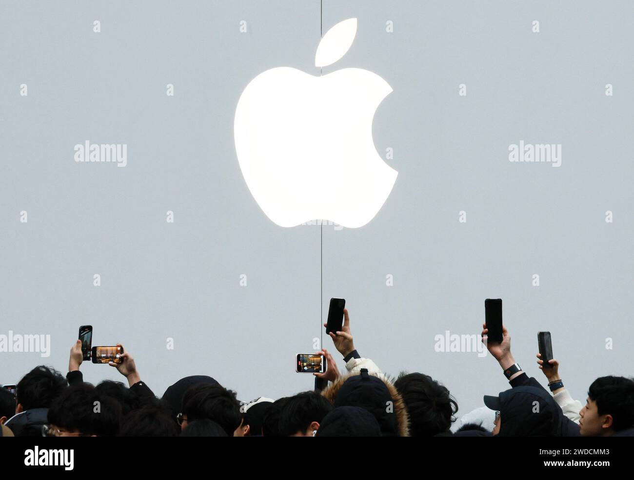 20th Jan, 2024. Apple opens new store in Seoul People take photos of a ...
