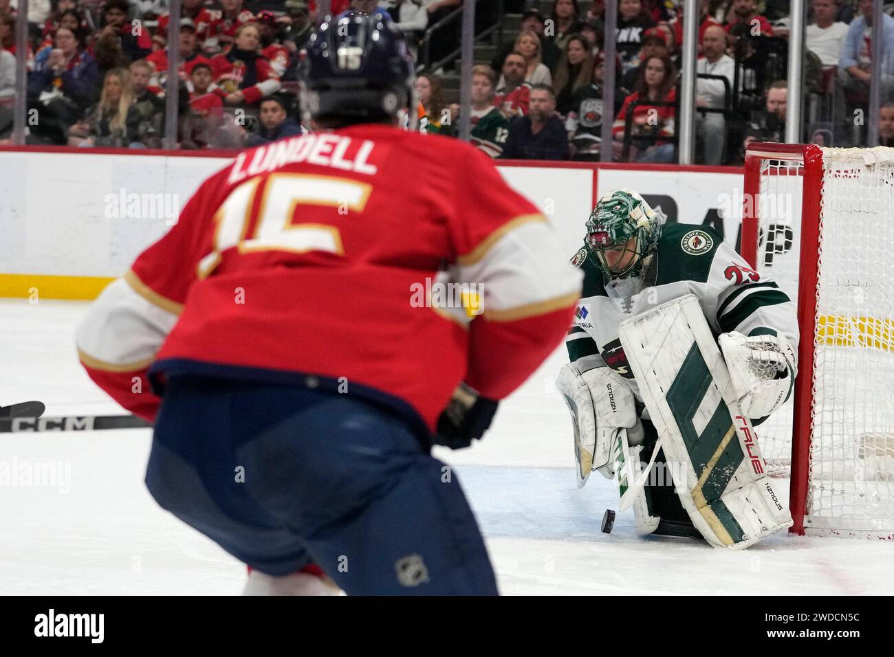 Minnesota Wild goaltender Filip Gustavsson, right, defends the goal ...