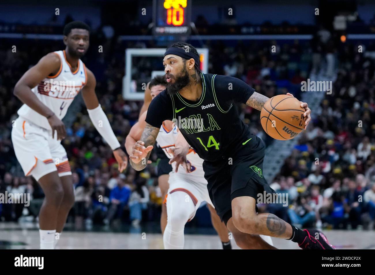 New Orleans Pelicans forward Brandon Ingram (14) drives to the basket ...