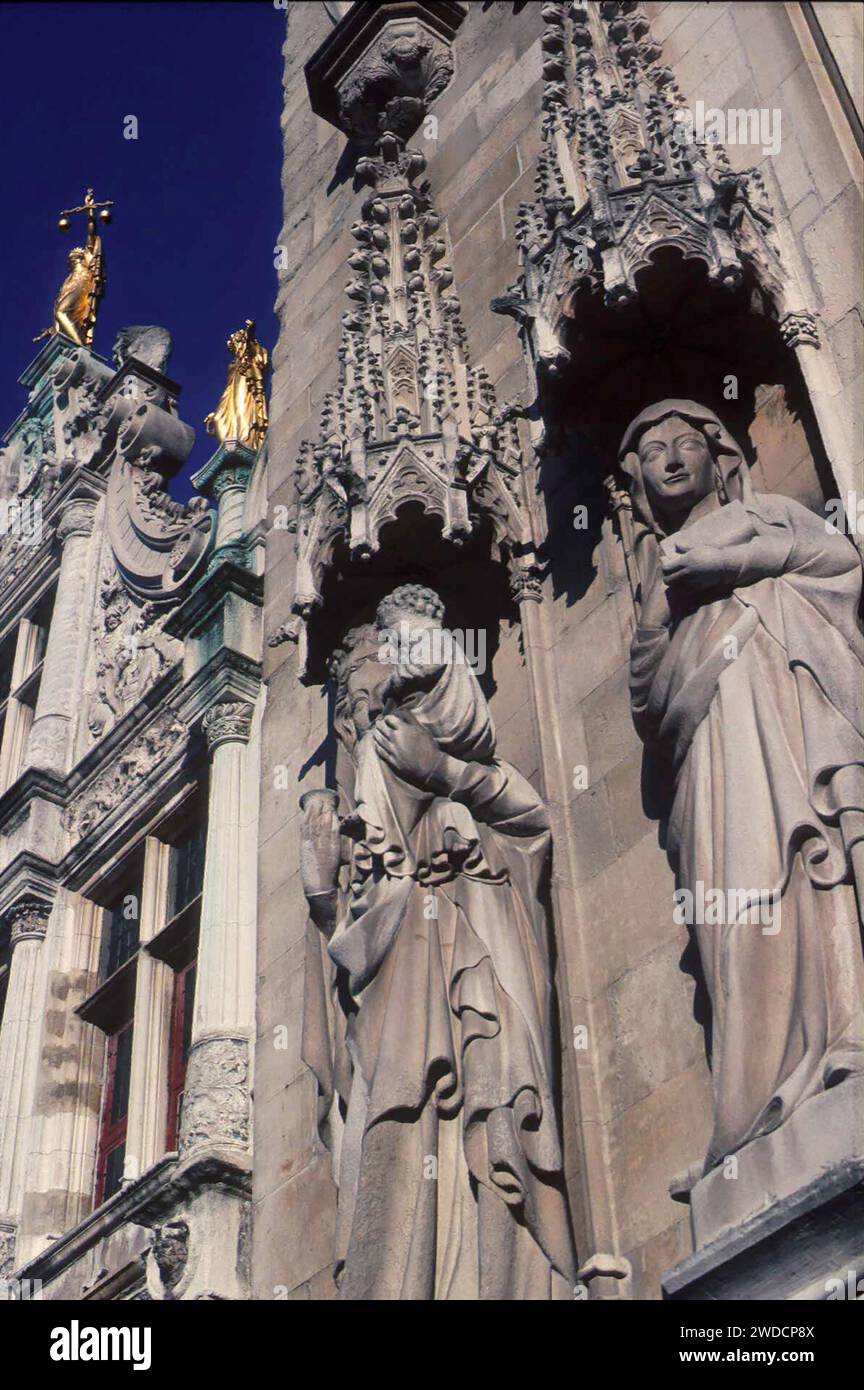 City Hall statues, adjacent to Old Civil Registry with gold leaf statue ...