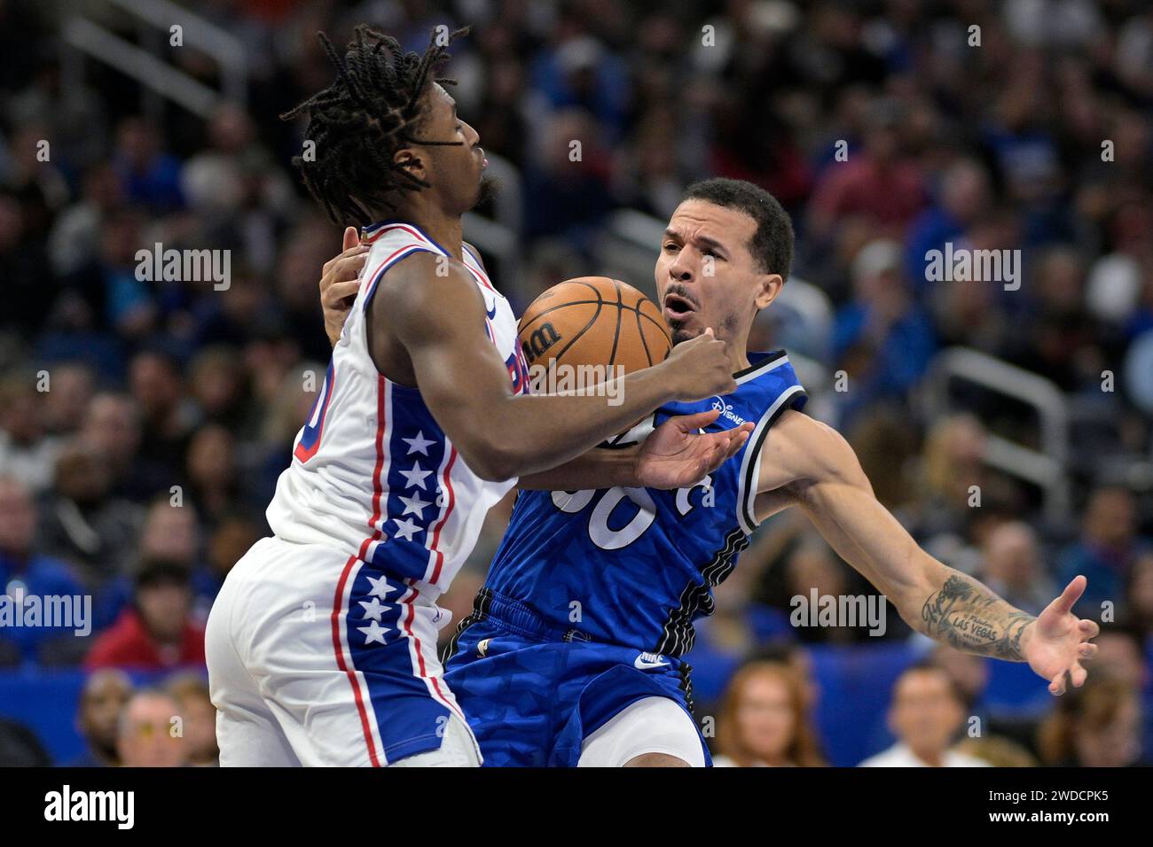 Philadelphia 76ers guard Tyrese Maxey, left, strips the ball away from ...