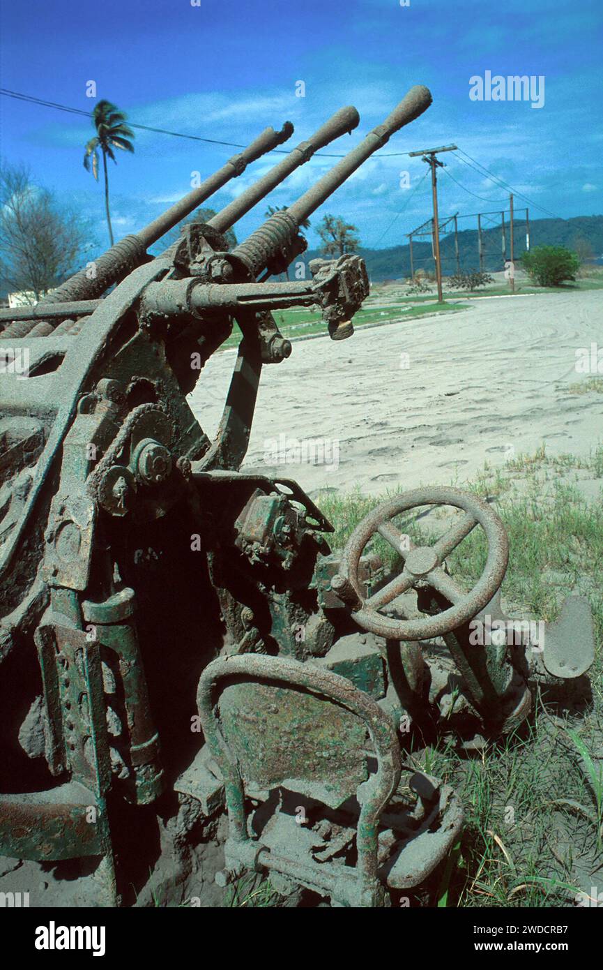 WWII Japanese anti-aircraft guns covered in ash from the Rabaul Volcano ...