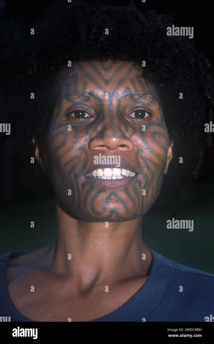 Woman with tattooed face, taken in 2003, Tufi, Cape Nelson, Oro ...
