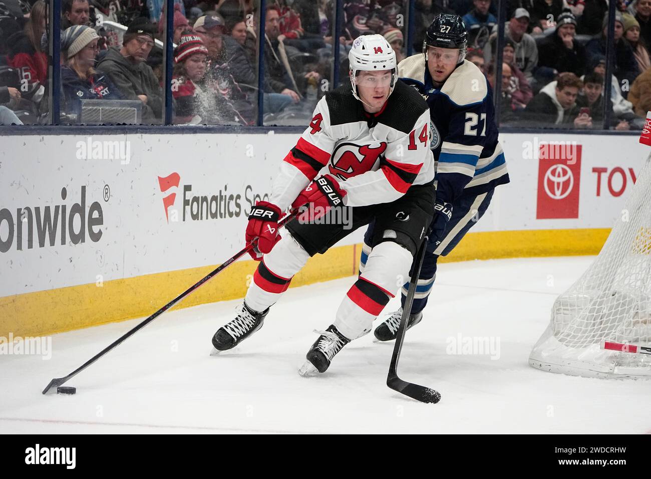 New Jersey Devils right wing Nathan Bastian (14) is pursued by Columbus ...