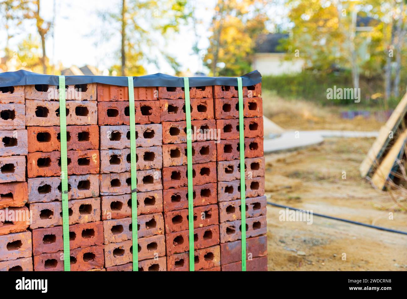 Stack of bricks for home construction with copy space Stock Photo - Alamy