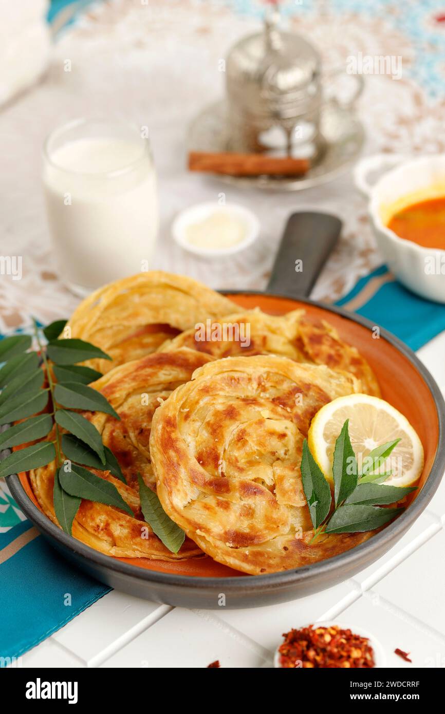 Roti Parata or Roti Canai with Lamb Curry Sauce, Served with Chilli ...