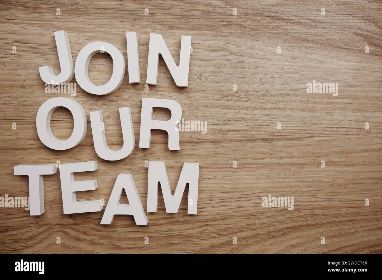 Join Our Team alphabet letters on wooden background Stock Photo - Alamy