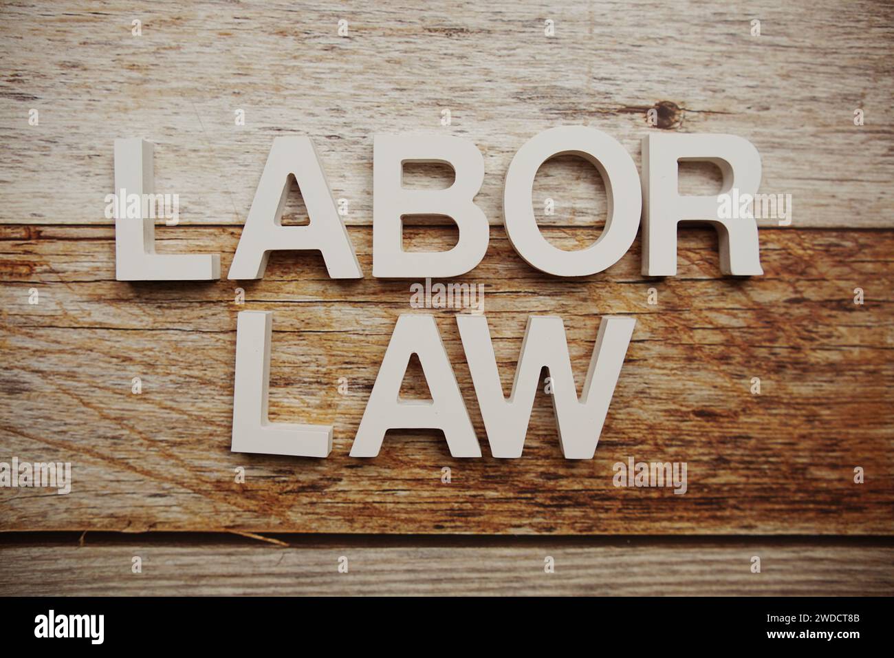 Labor Law alphabet letters on wooden background Stock Photo - Alamy