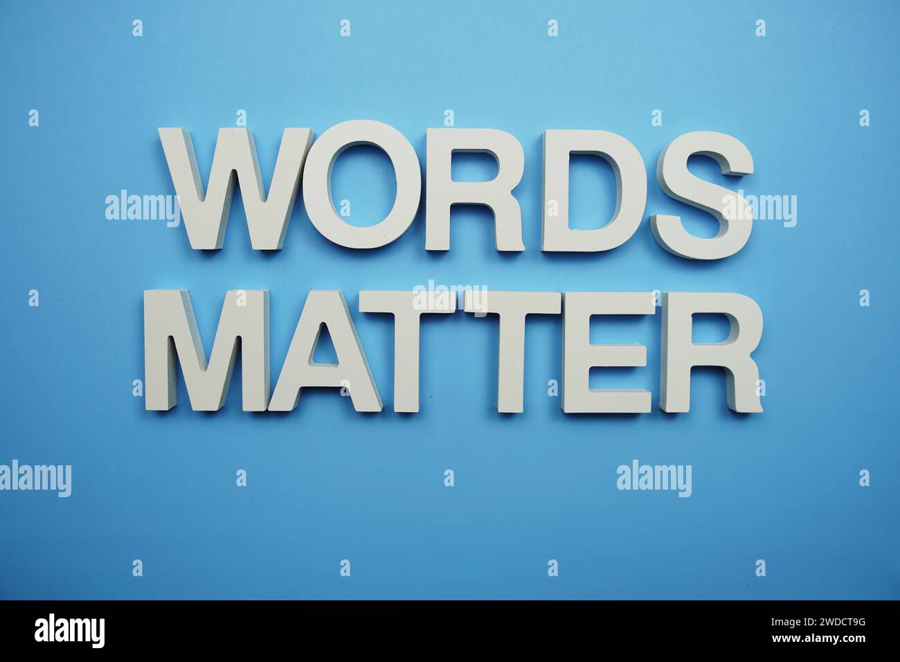 Word Matter alphabet letters on blue background Stock Photo - Alamy