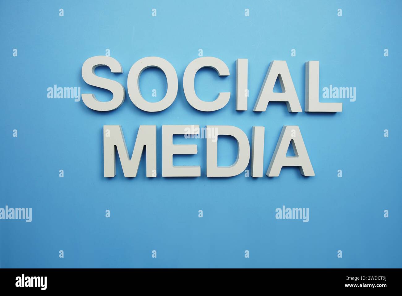 Social Media alphabet letters on blue background Stock Photo - Alamy