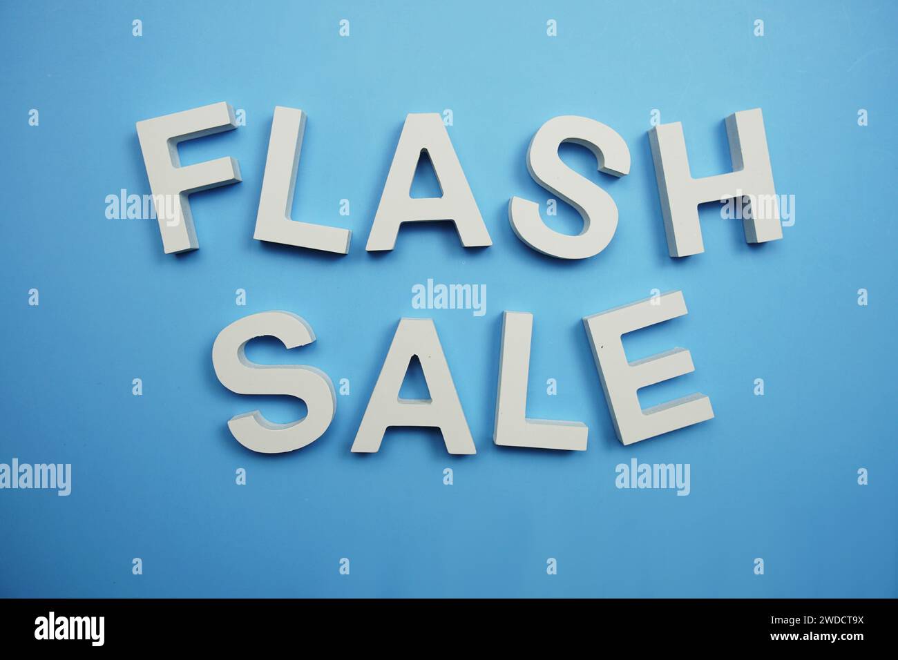 Flash Sale alphabet letters on blue background Stock Photo - Alamy
