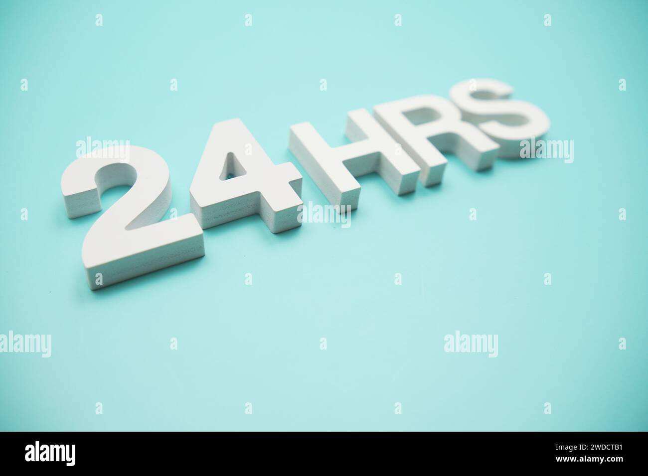 24 Hours alphabet letters on blue background Stock Photo - Alamy