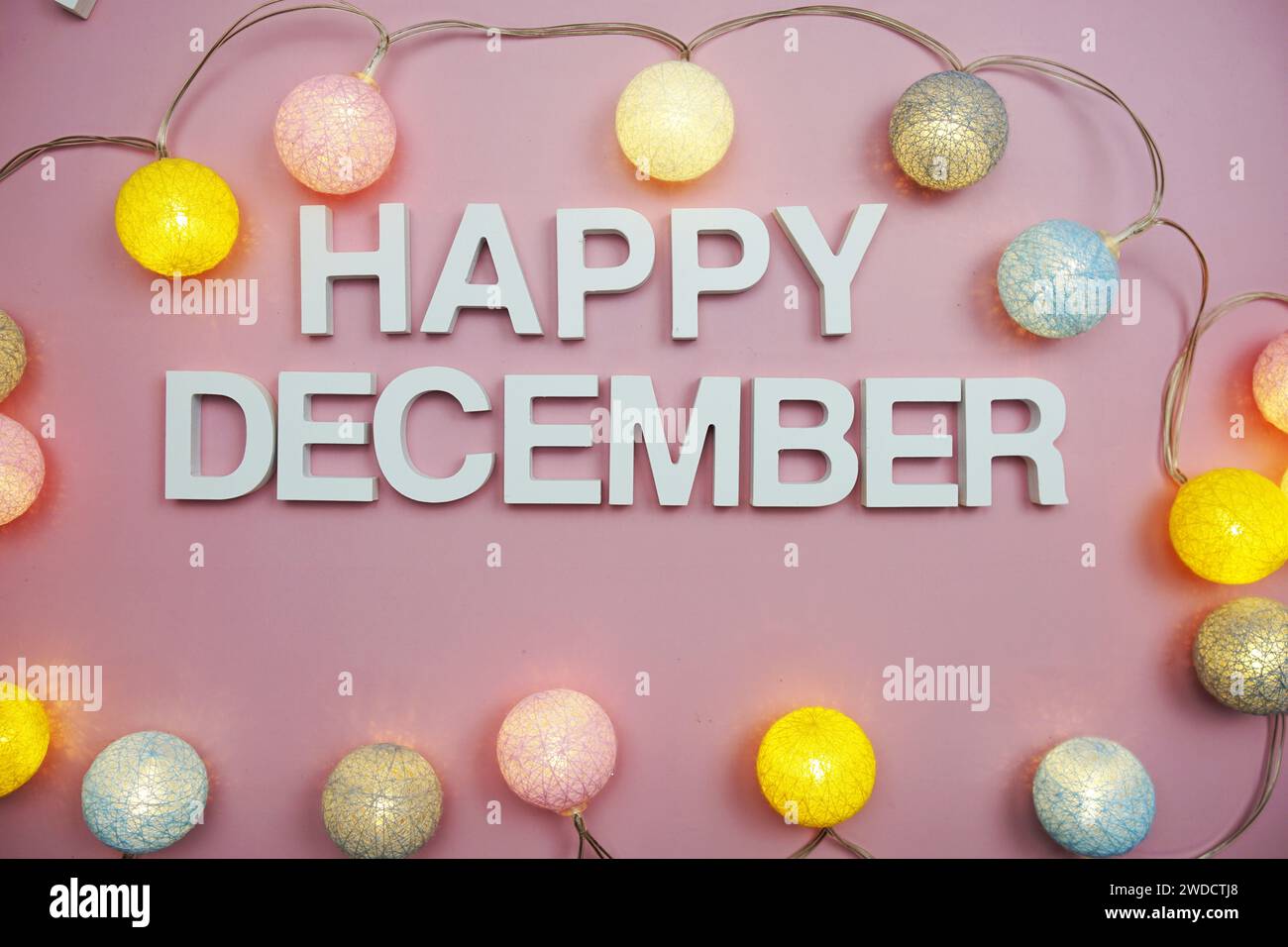 Happy December alphabet letters on pink background Stock Photo - Alamy