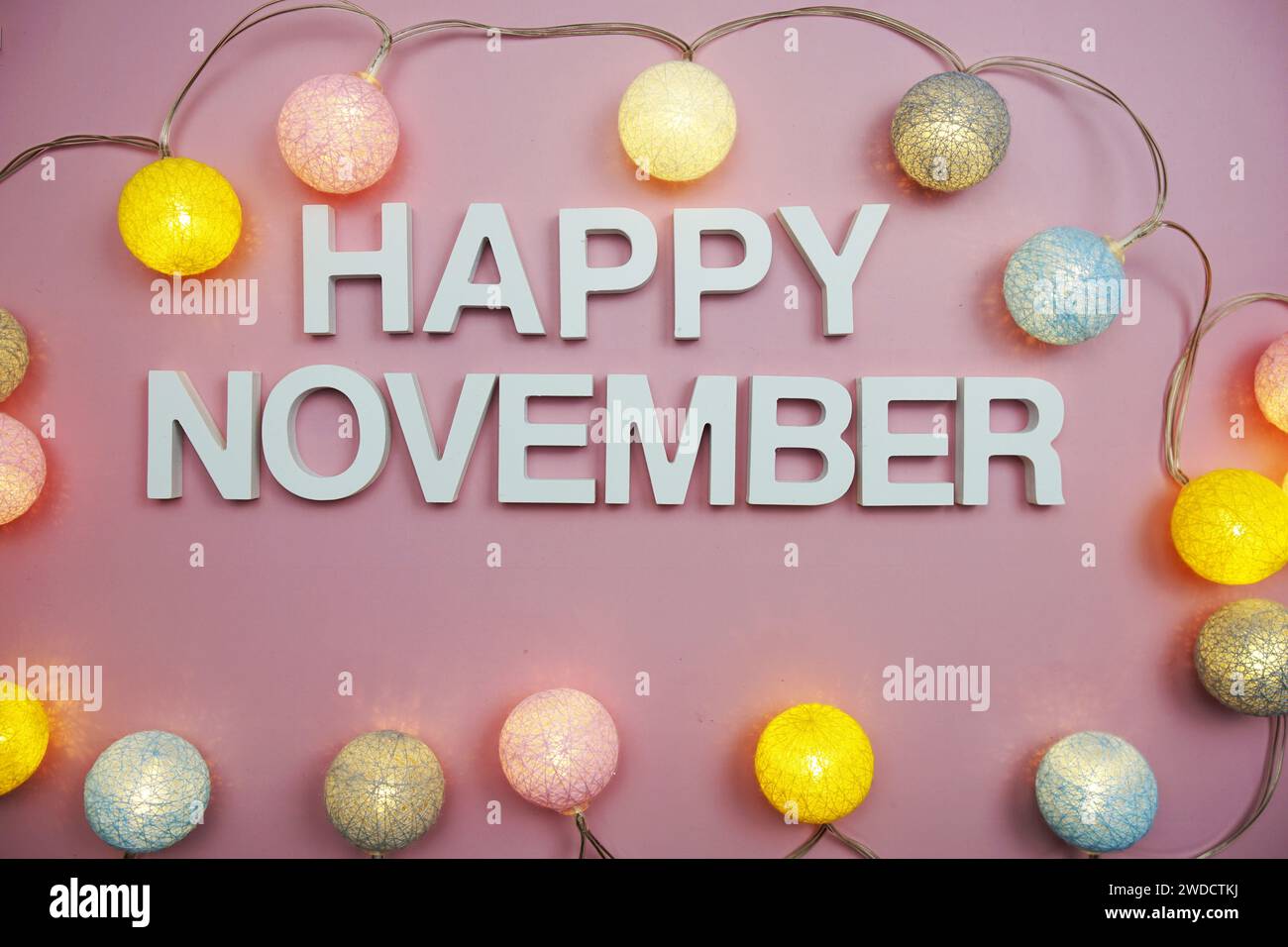 Happy November alphabet letters on pink background Stock Photo - Alamy