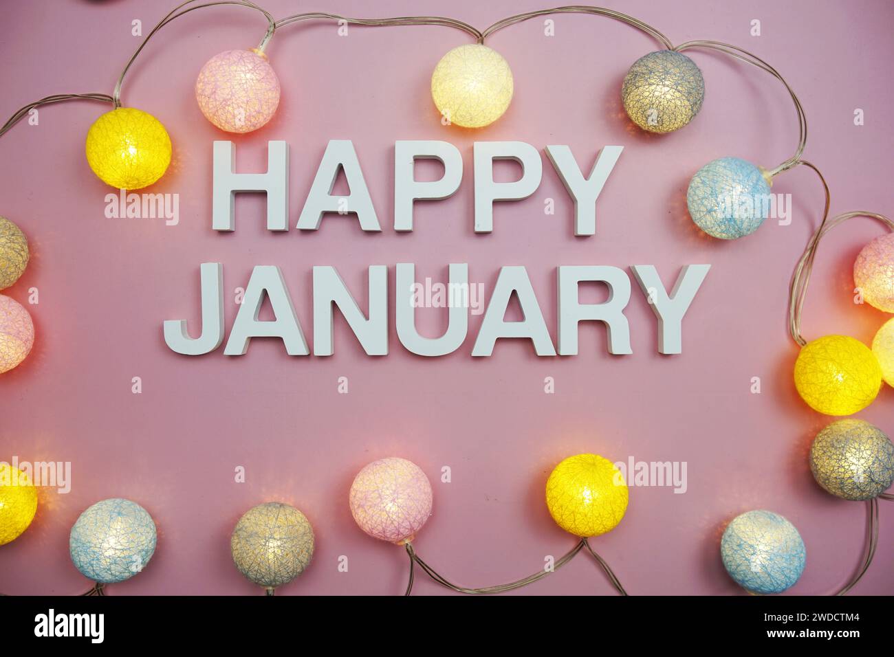 Happy January alphabet letters on pink background Stock Photo - Alamy